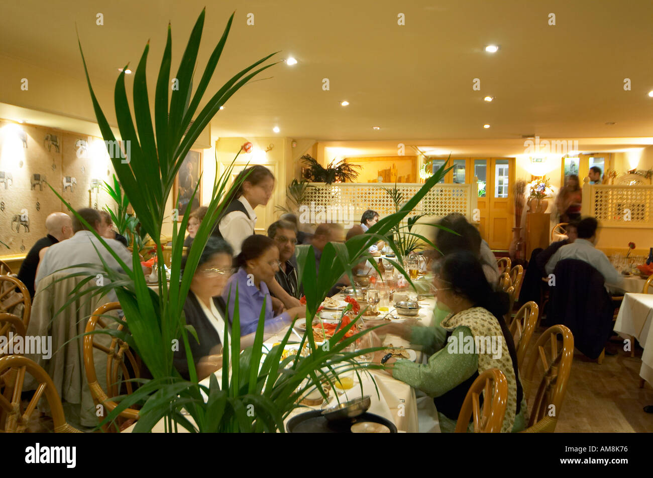 Diners and waiters in Haandi Indian Restaurant London SW3 Stock Photo ...