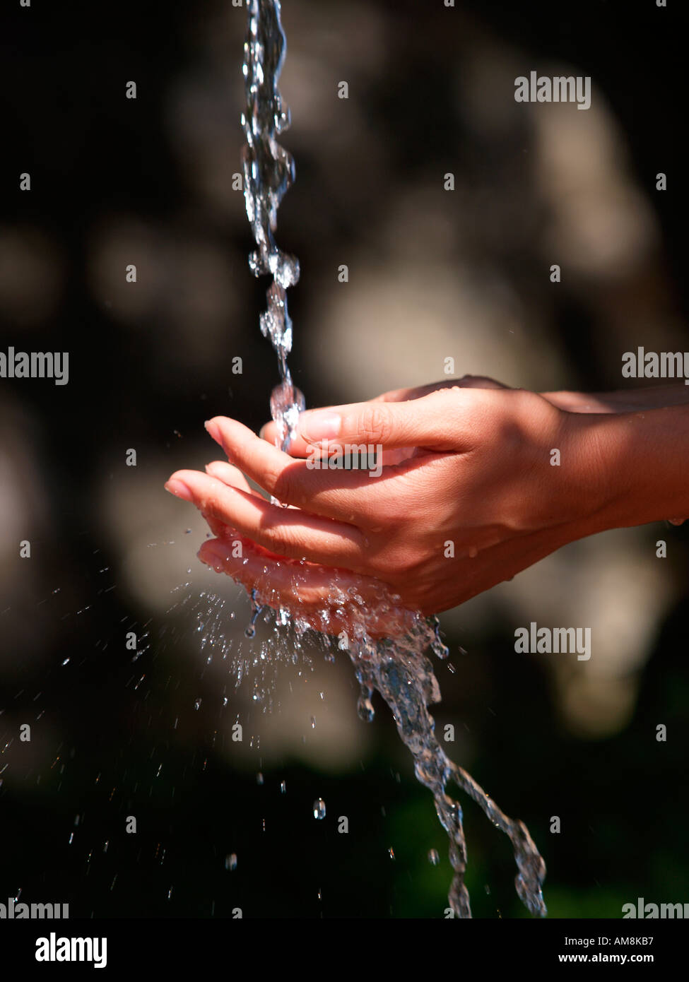 Cupped hands under running hi-res stock photography and images - Alamy