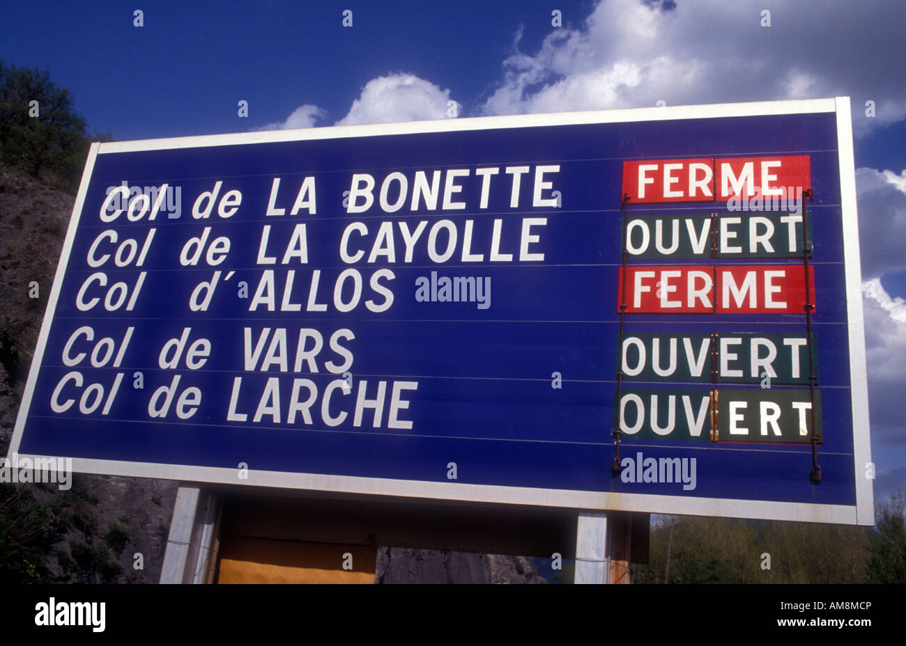 Road information sign for mountain passes in Frnch alps Stock Photo - Alamy