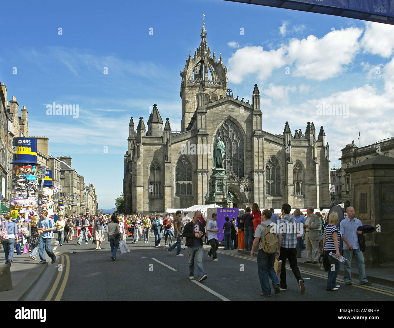 The Royal Mile in Edinburgh bursting with activity and visitors during ...