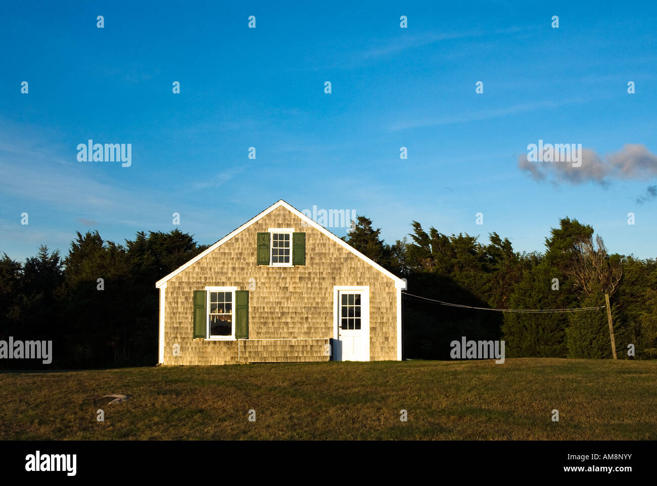 Simple Cape Cod cottage with clothesline Cape Cod MA Stock Photo - Alamy