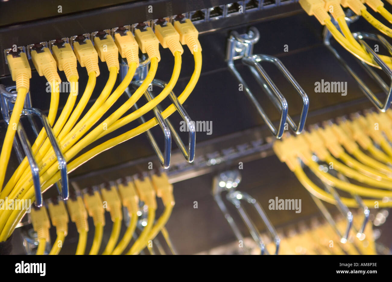 yellow ethernet cables connect black ethernet hubs Stock Photo - Alamy