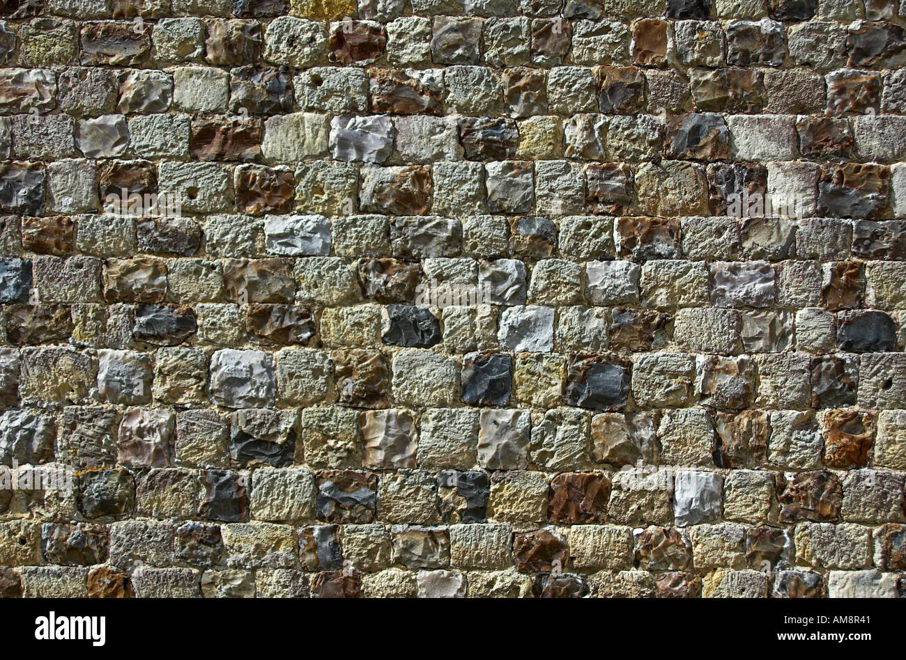 Patterns of brick and flint in an old wall Stock Photo - Alamy