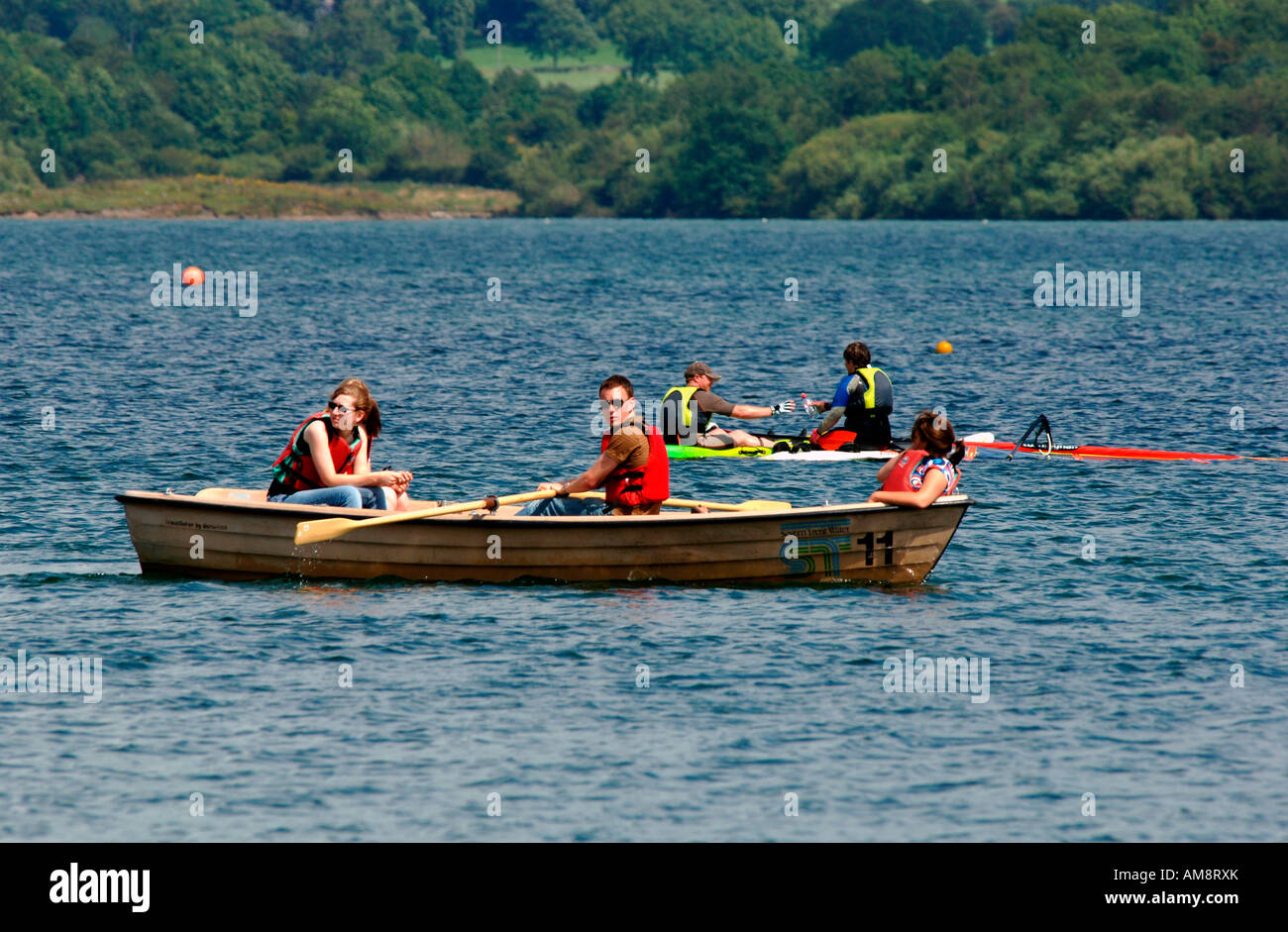 Family In A Rowing Boat,On Carsington Water In Derbyshire England Stock ...