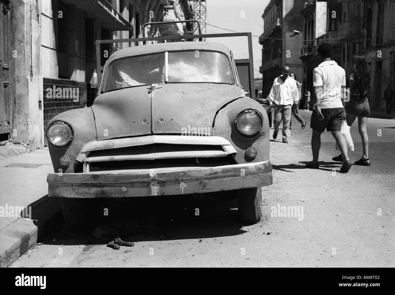 Old battered rusty Chevrolet car Scene in a street in old Havanna near ...