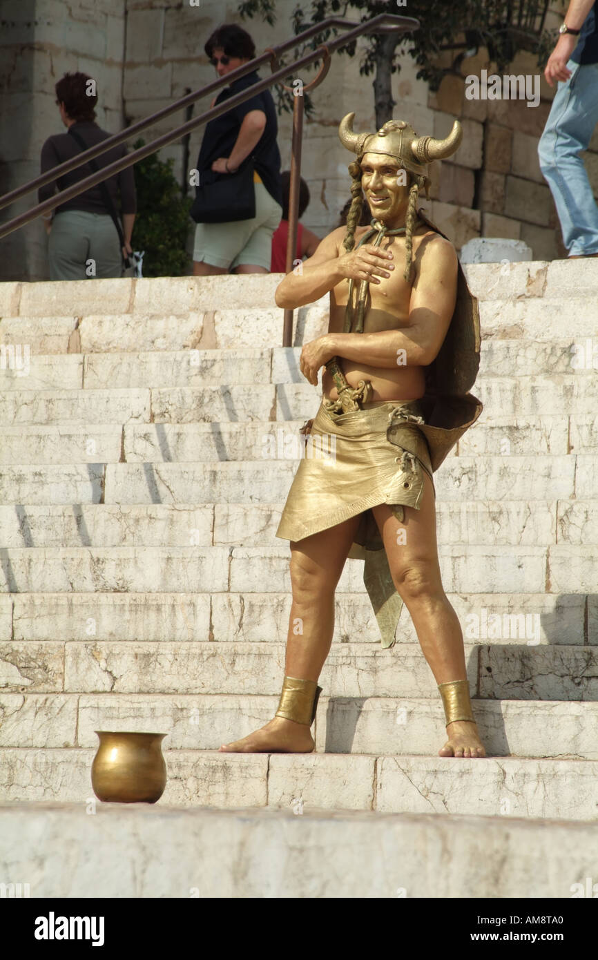 Human sculpture gold painted Viking with collection pot Palma Mallorca ...