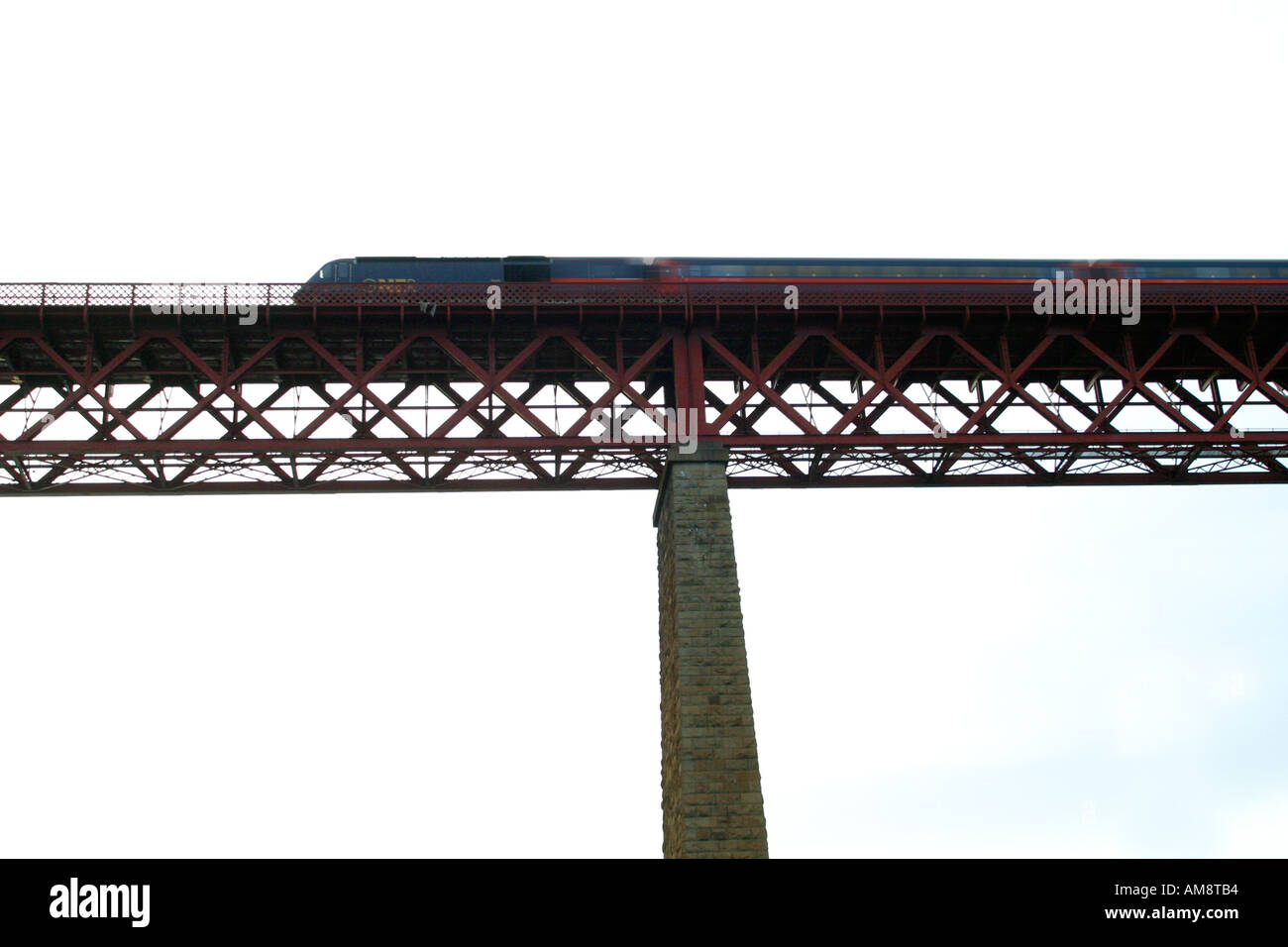 Forth Rail Bridge detail with train passing Stock Photo - Alamy