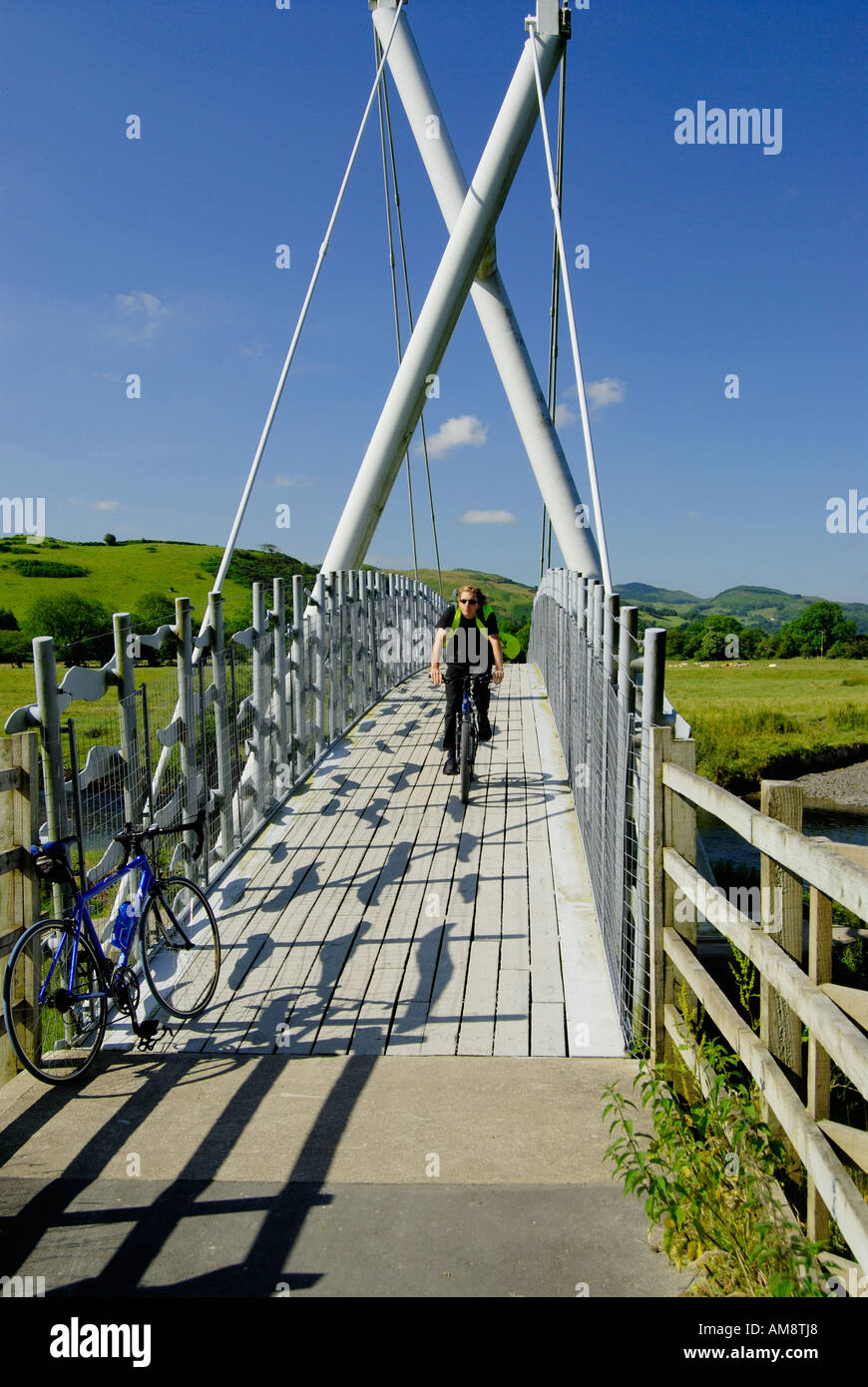 Cyclist on Dyfi Cycle Bridge River Dyfi Machynlleth Mid Wales Stock ...