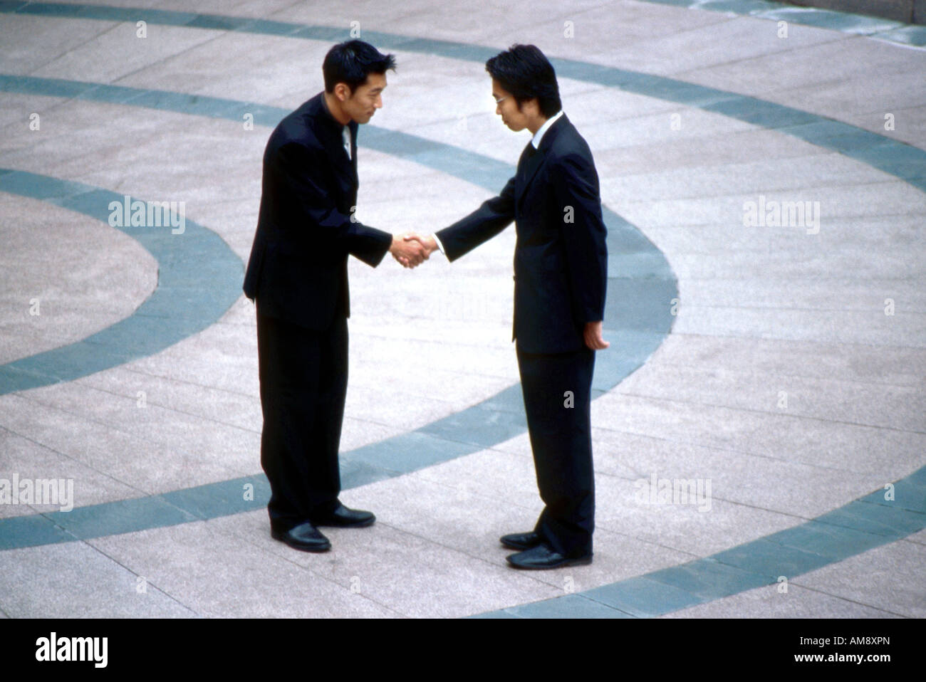 Two Men Shaking Hands Stock Photo - Alamy
