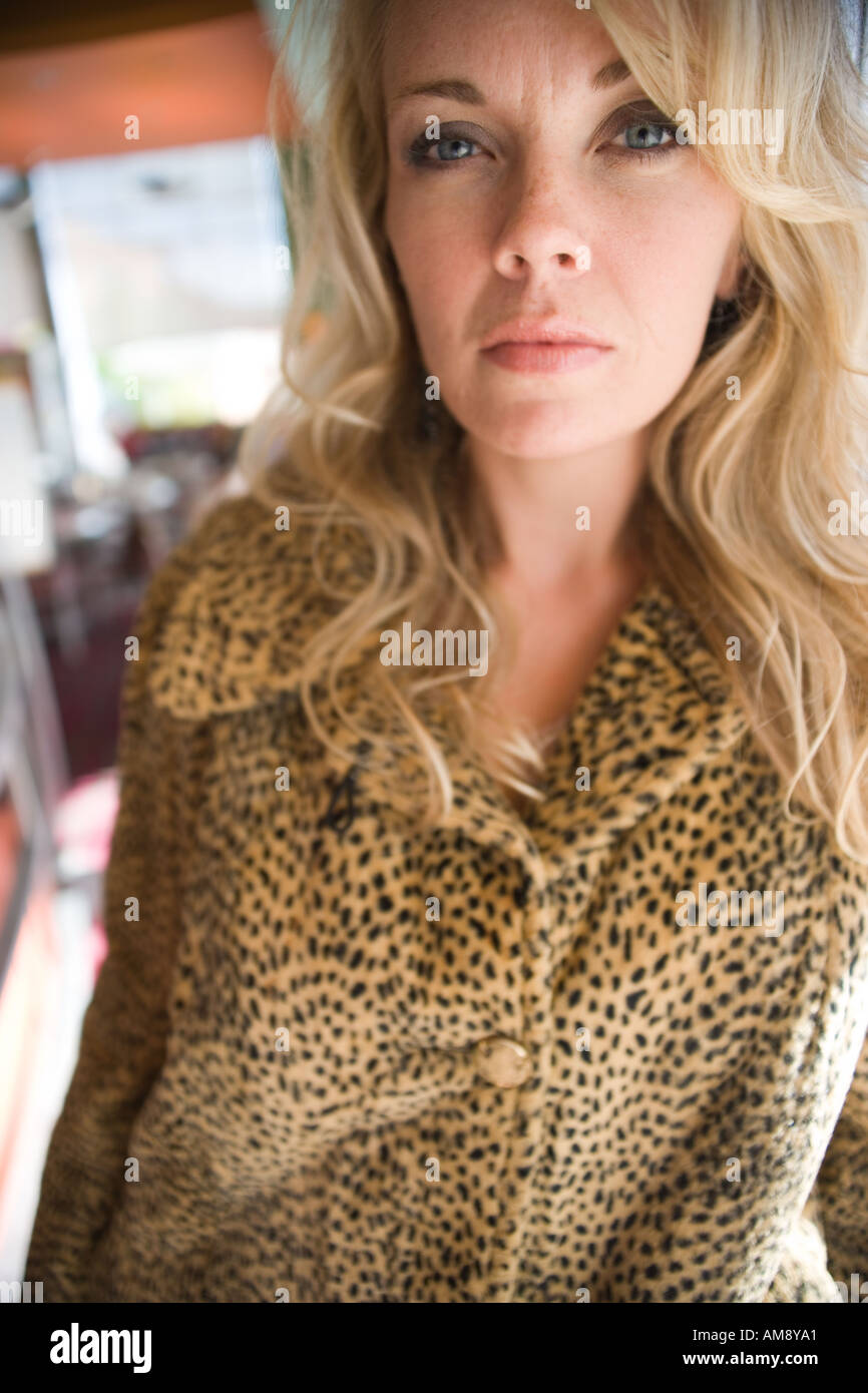 Woman wearing leopard skin hi-res stock photography and images - Alamy