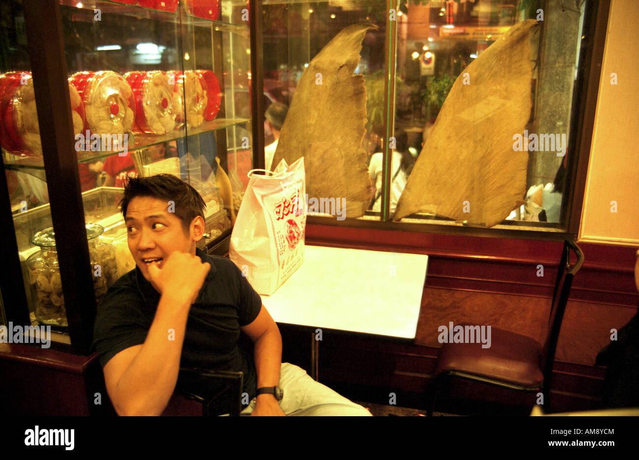 Man in Restaurant Serving Shark Fin Soup Stock Photo - Alamy