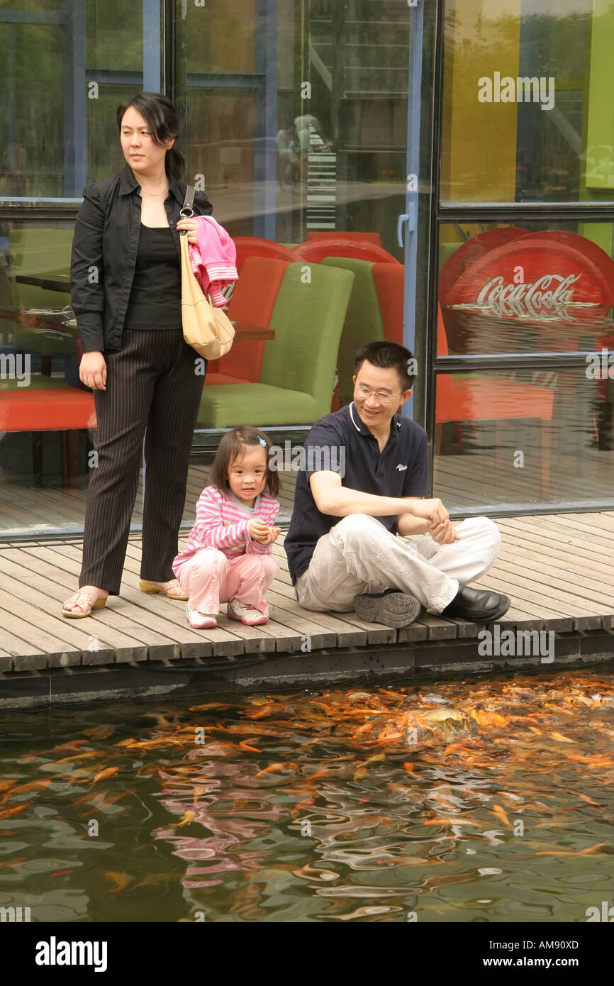 Chinese girl child fish hi-res stock photography and images - Alamy