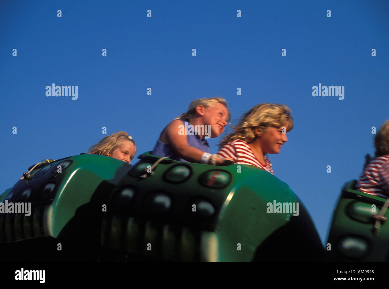 Kids on Roller Coaster Stock Photo - Alamy