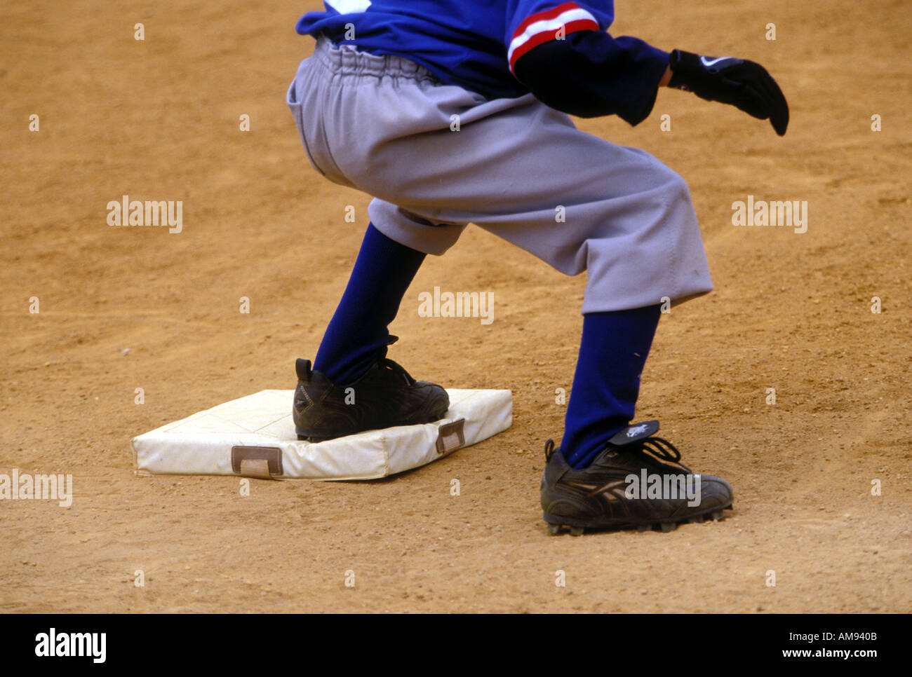 Baseball boy standing on base hi-res stock photography and images - Alamy