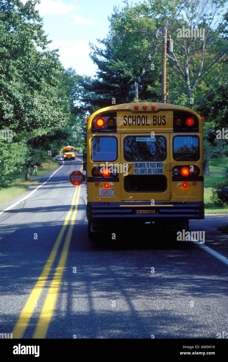 Boy and girl at bus stop hi-res stock photography and images - Alamy