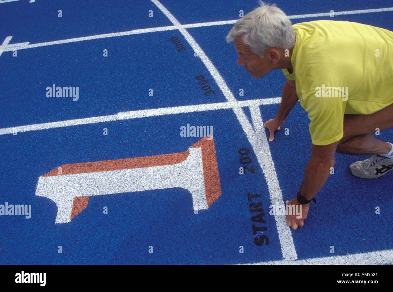 Senior Man At Starting Line Stock Photo - Alamy