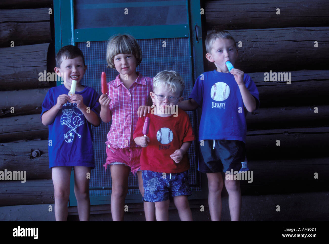 Kids Eating Popsicles Stock Photo - Alamy