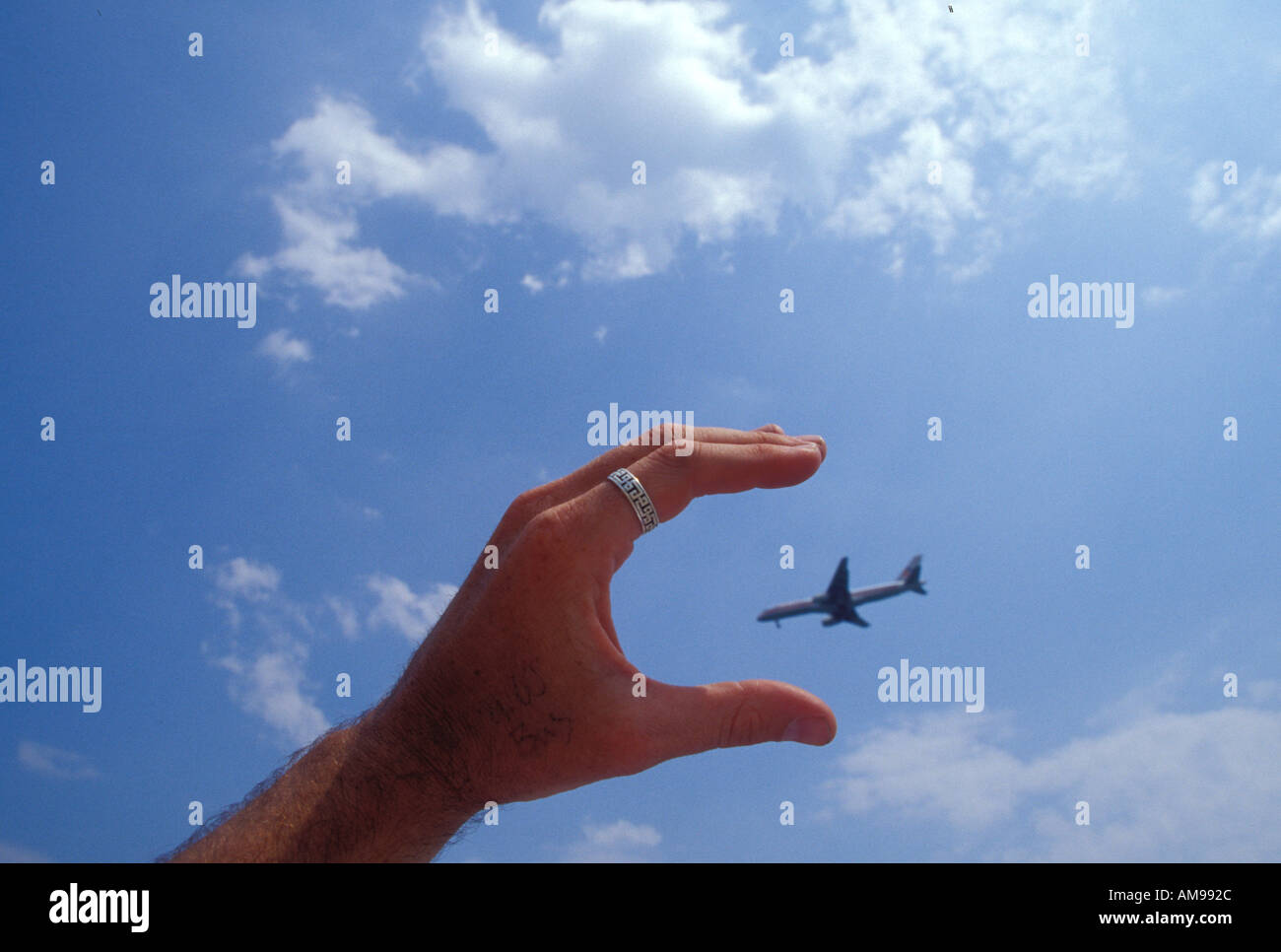 Plane in Hand Stock Photo - Alamy