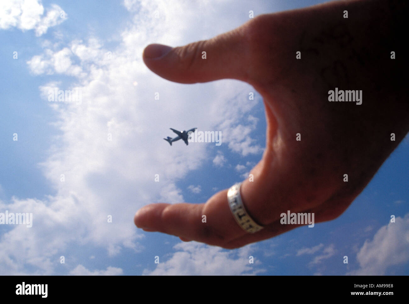 hand with plane Stock Photo - Alamy
