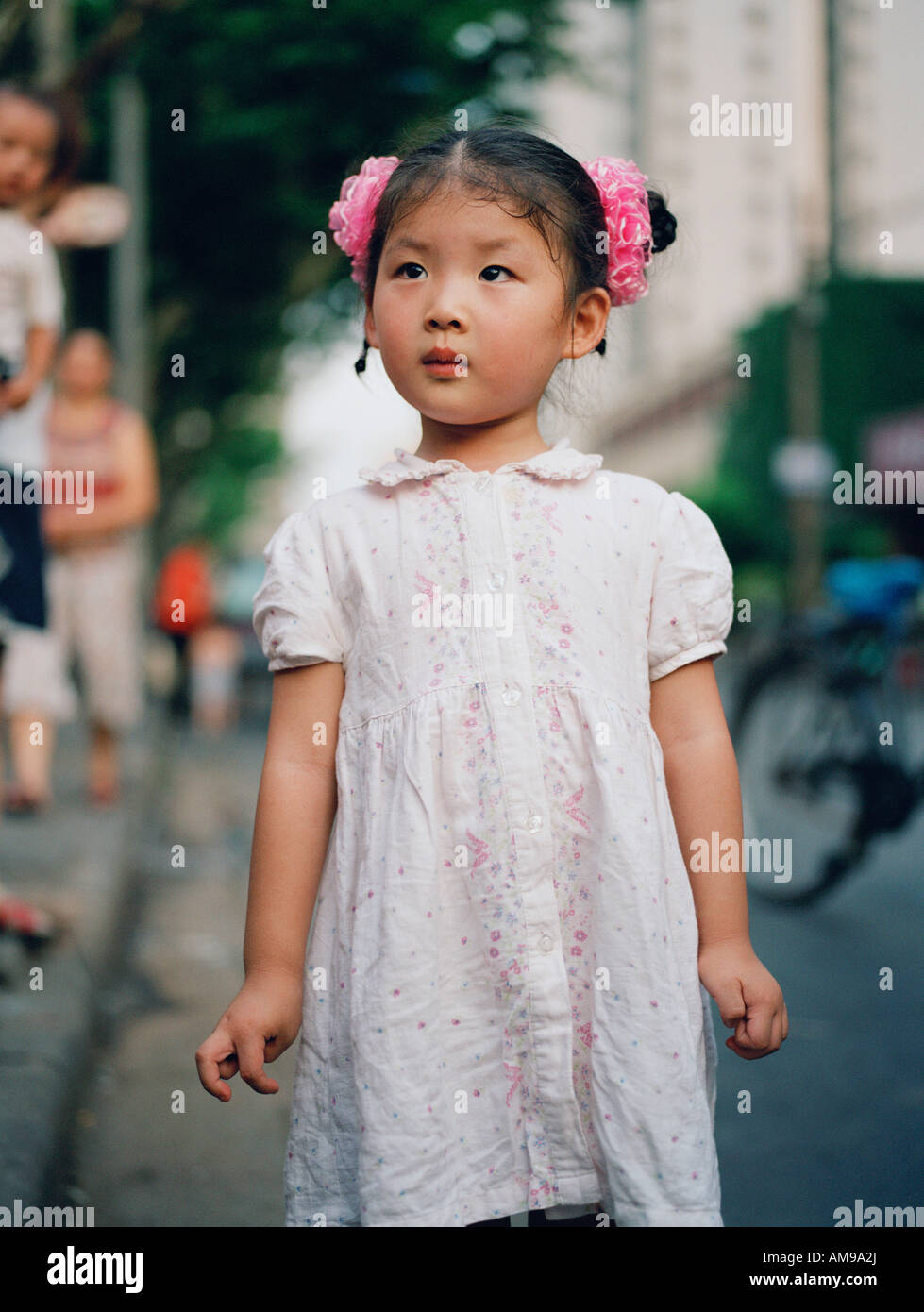 A tender child walking the street Stock Photo - Alamy