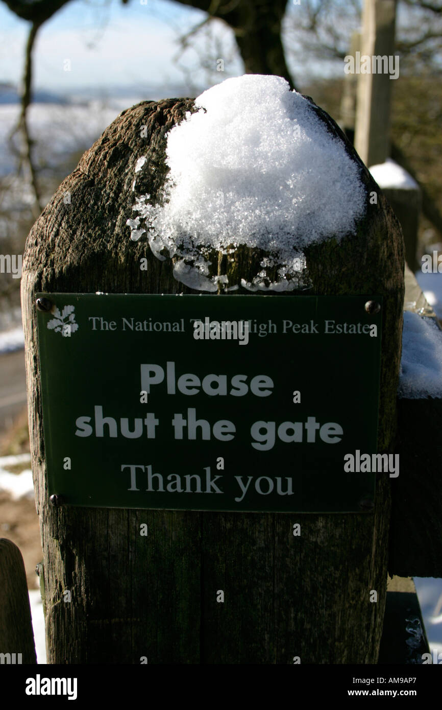snow on please shut the gate sign post derbyshire peak district ...