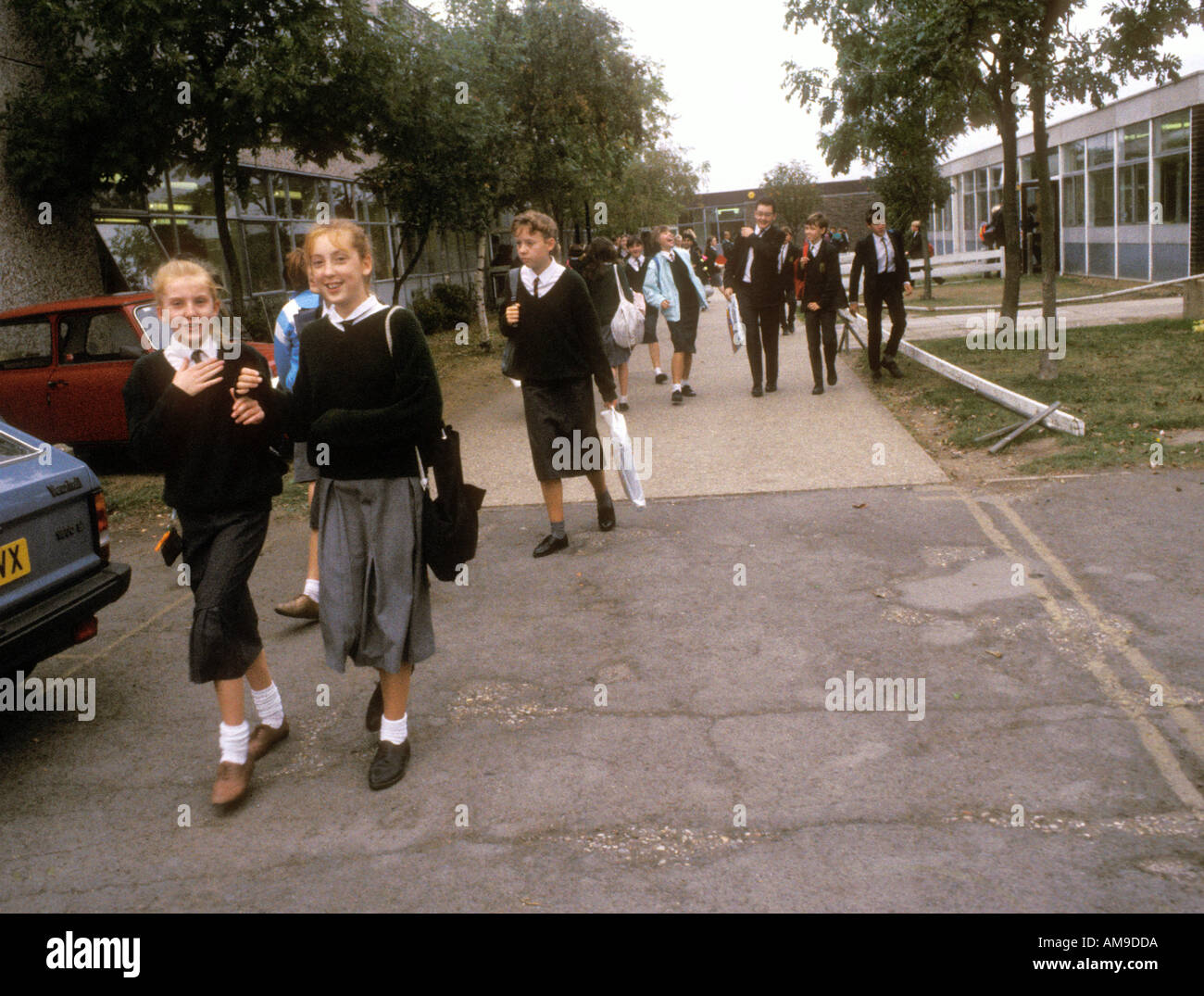 School children coming out of school on way home Stock Photo - Alamy