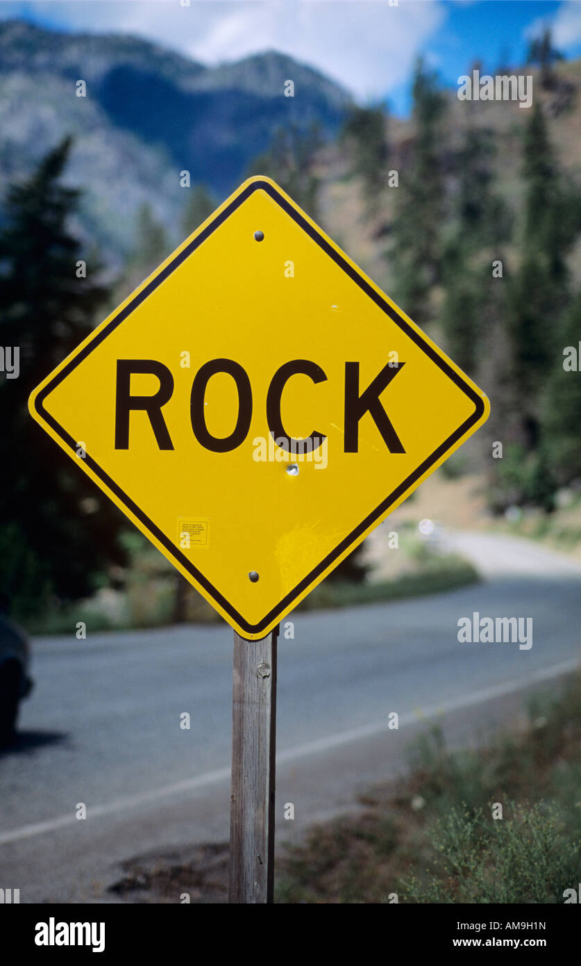 Road sign warning of rockfall Stock Photo - Alamy