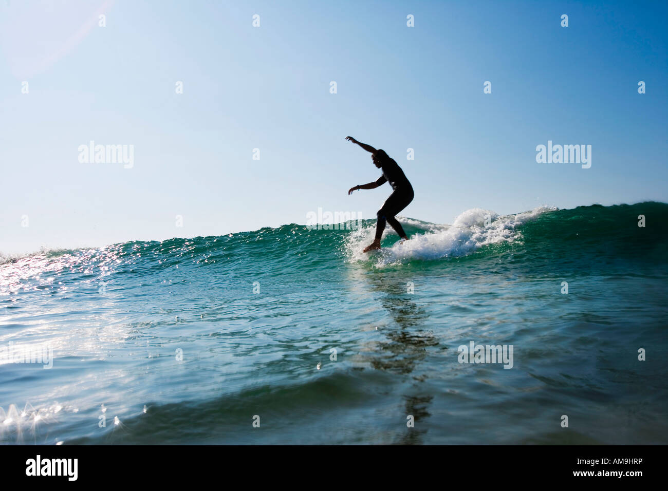 Man surfing a wave Stock Photo - Alamy