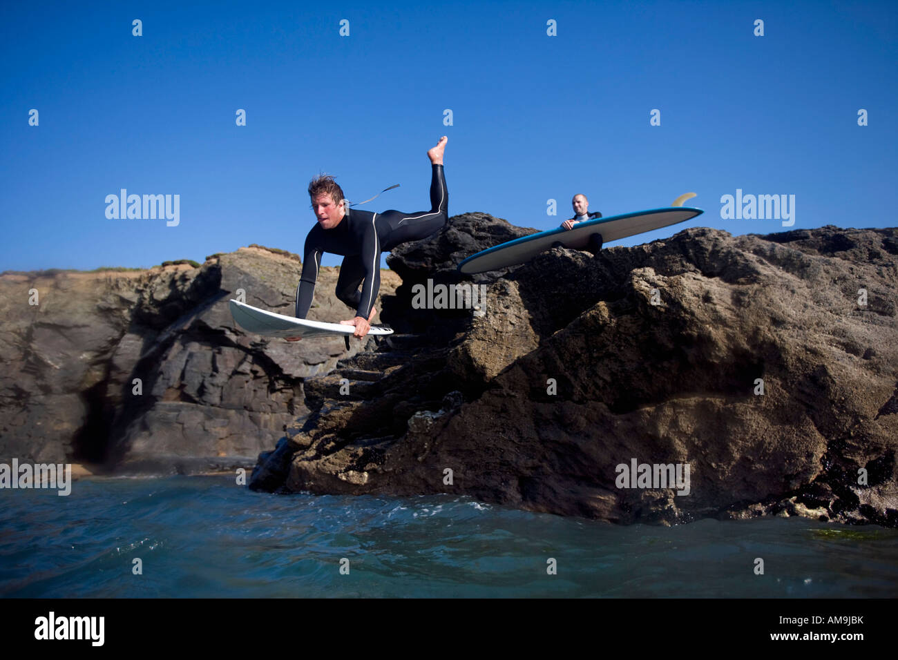 Jumping onto rocks hi-res stock photography and images - Alamy