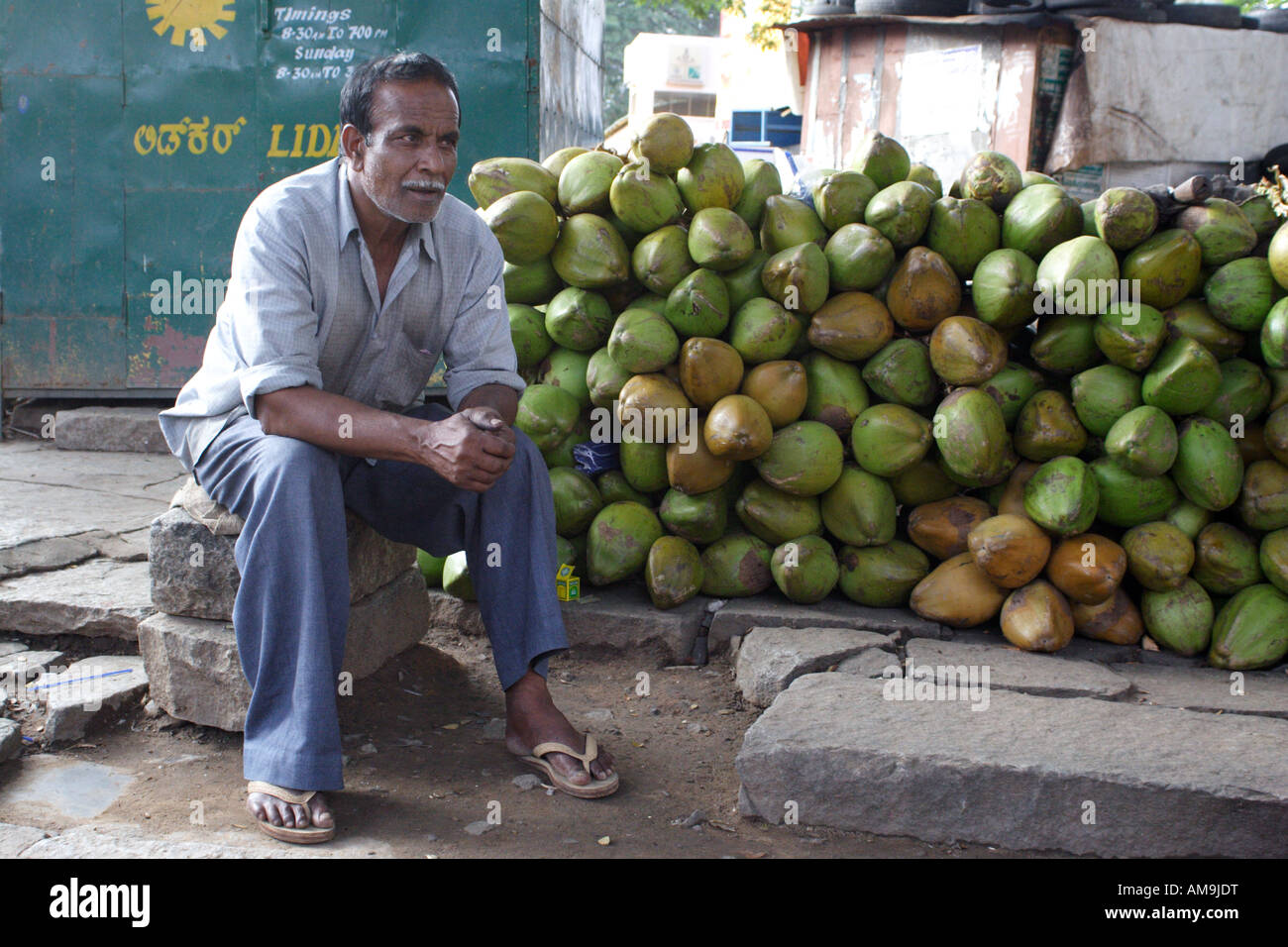Tender coconut seller hi-res stock photography and images - Alamy