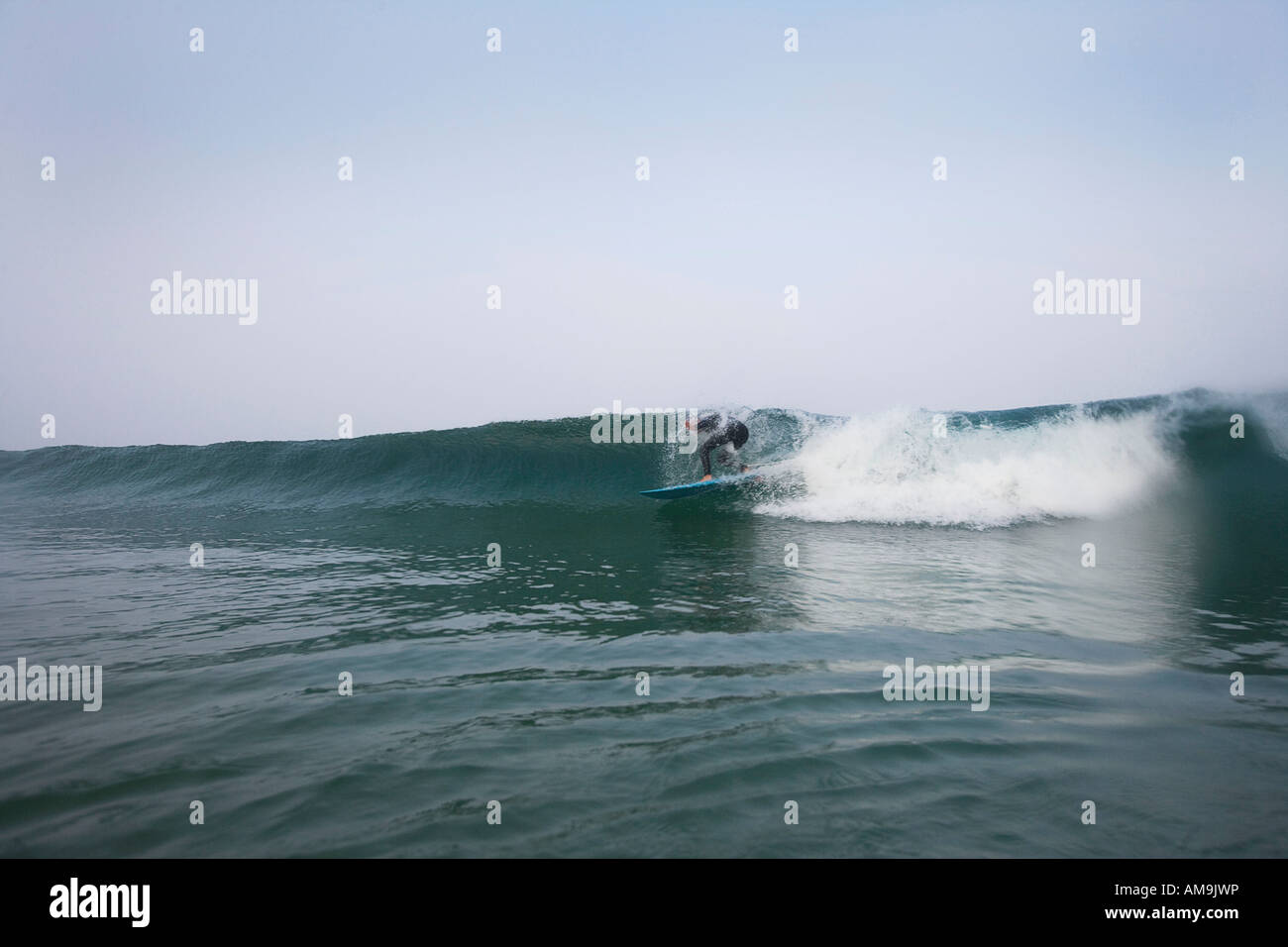 Side profile of a man surfing hi-res stock photography and images - Alamy