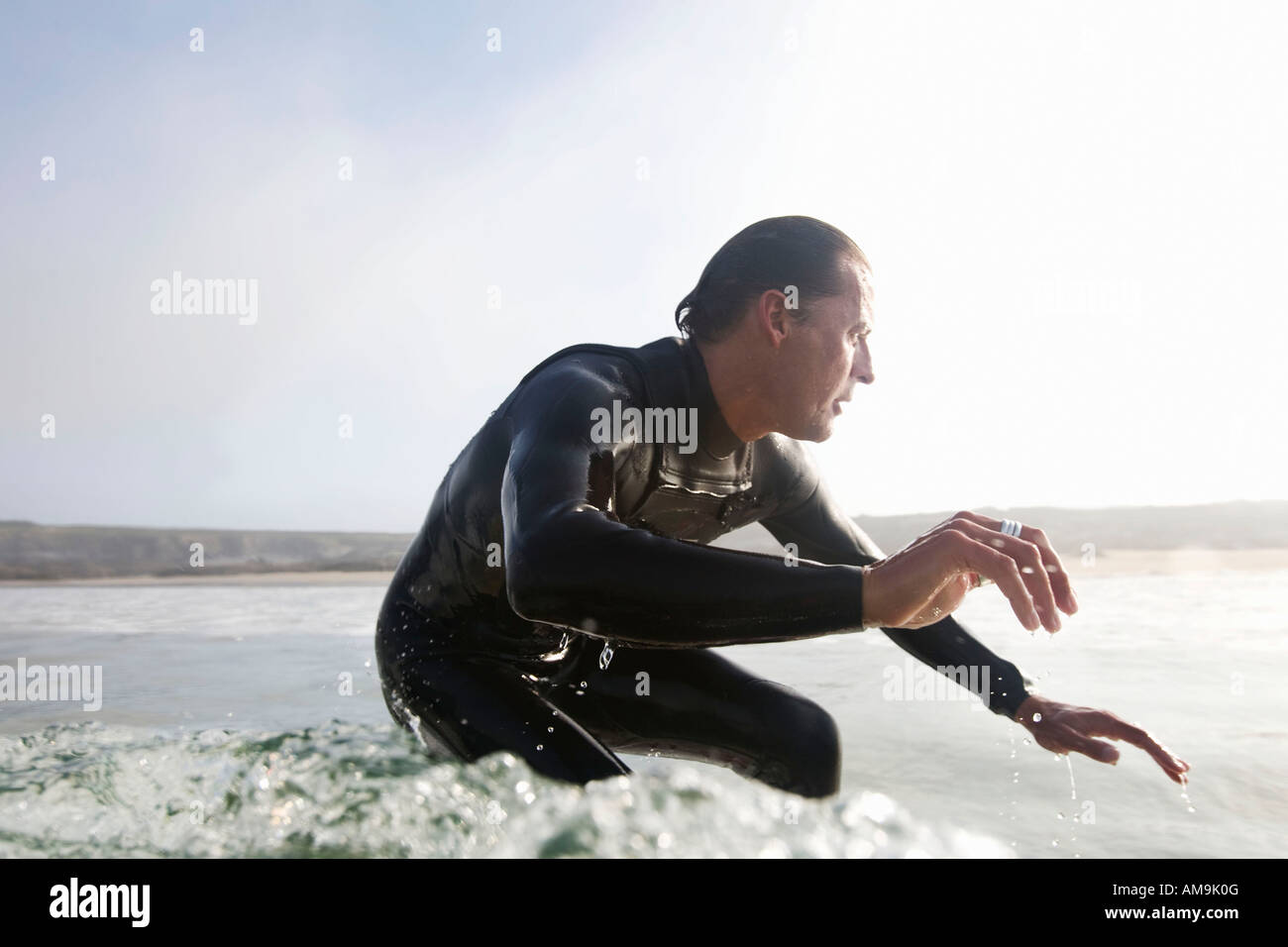Man surfing a wave Stock Photo - Alamy