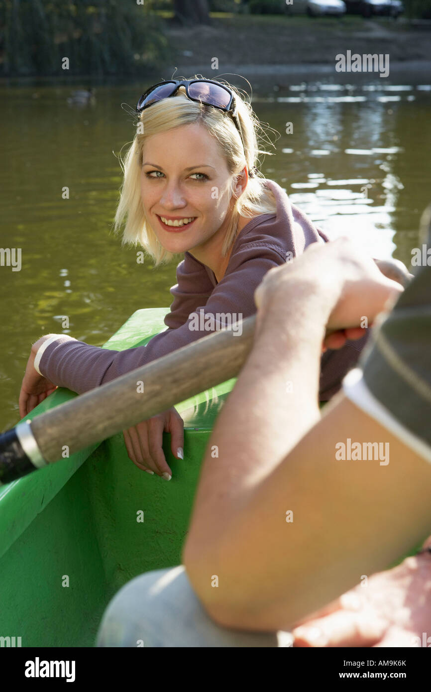 Side view couple rowing boat hi-res stock photography and images - Alamy