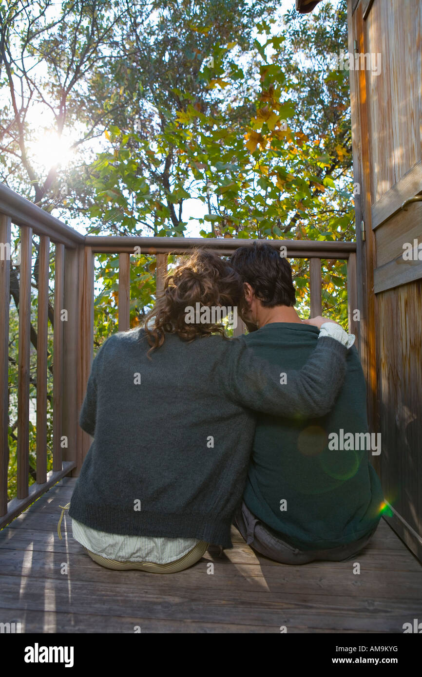 Two people on balcony behind hi-res stock photography and images - Alamy