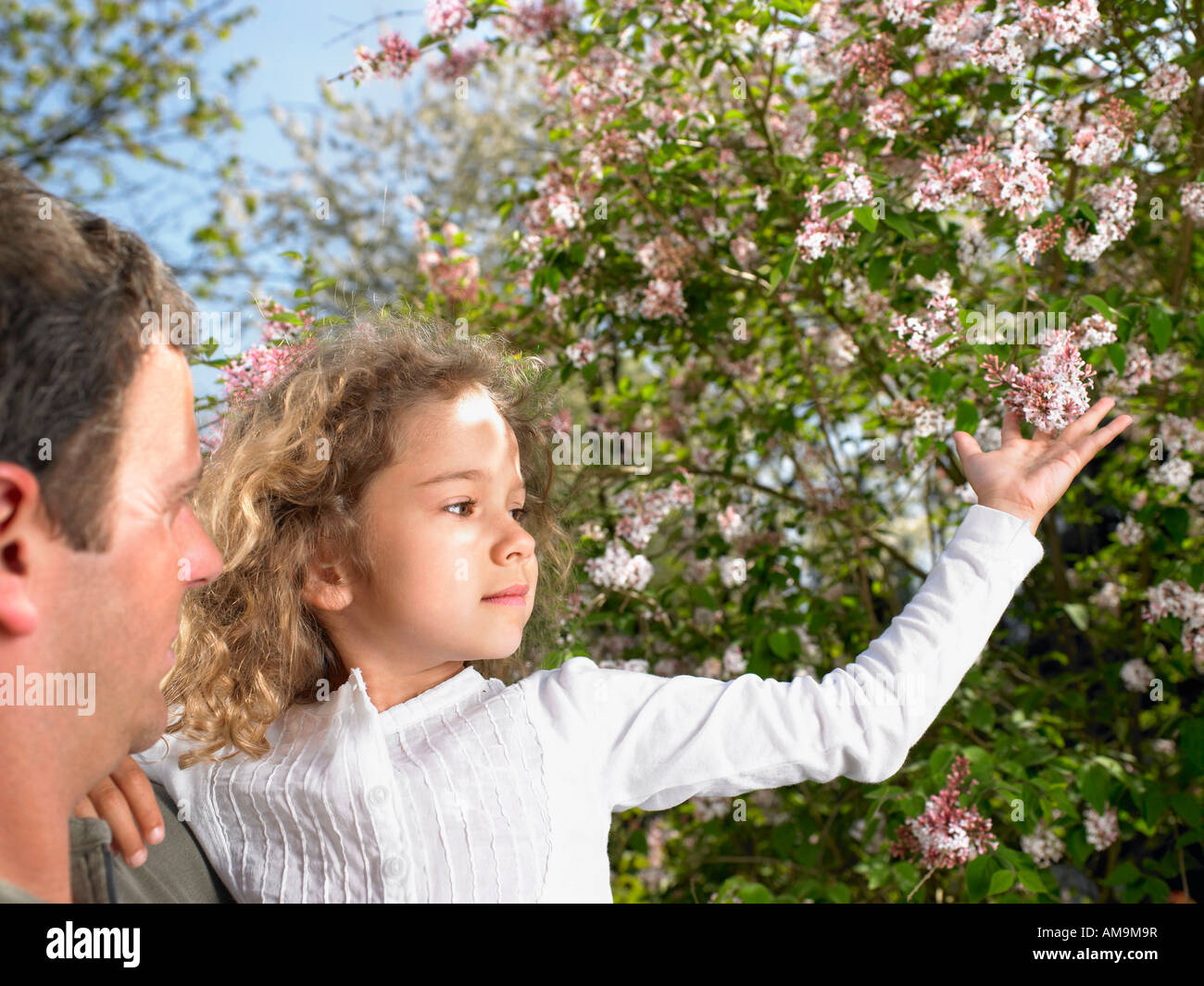 Girl beside a tree hi-res stock photography and images - Alamy