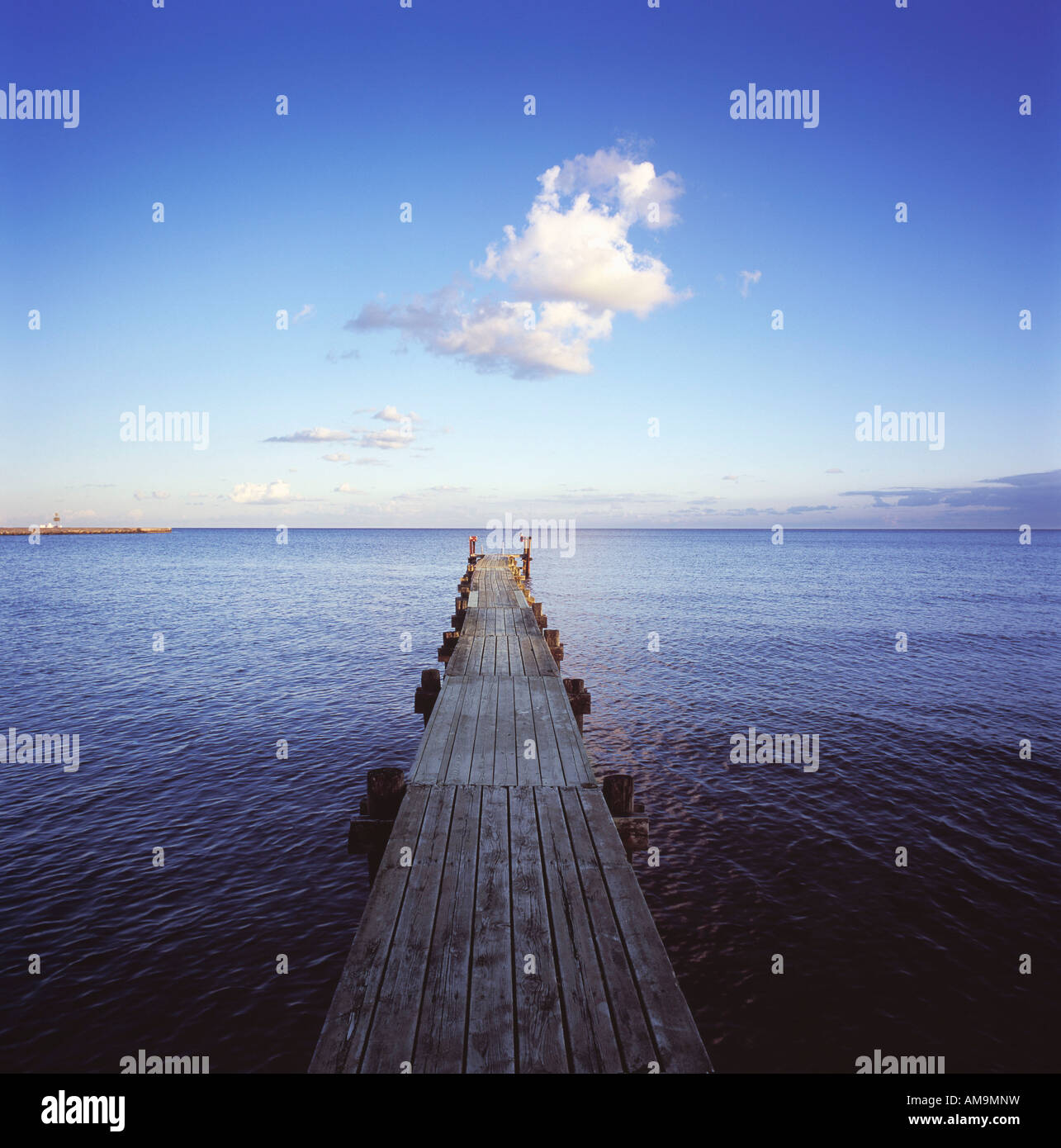 A long dock over a water Stock Photo - Alamy