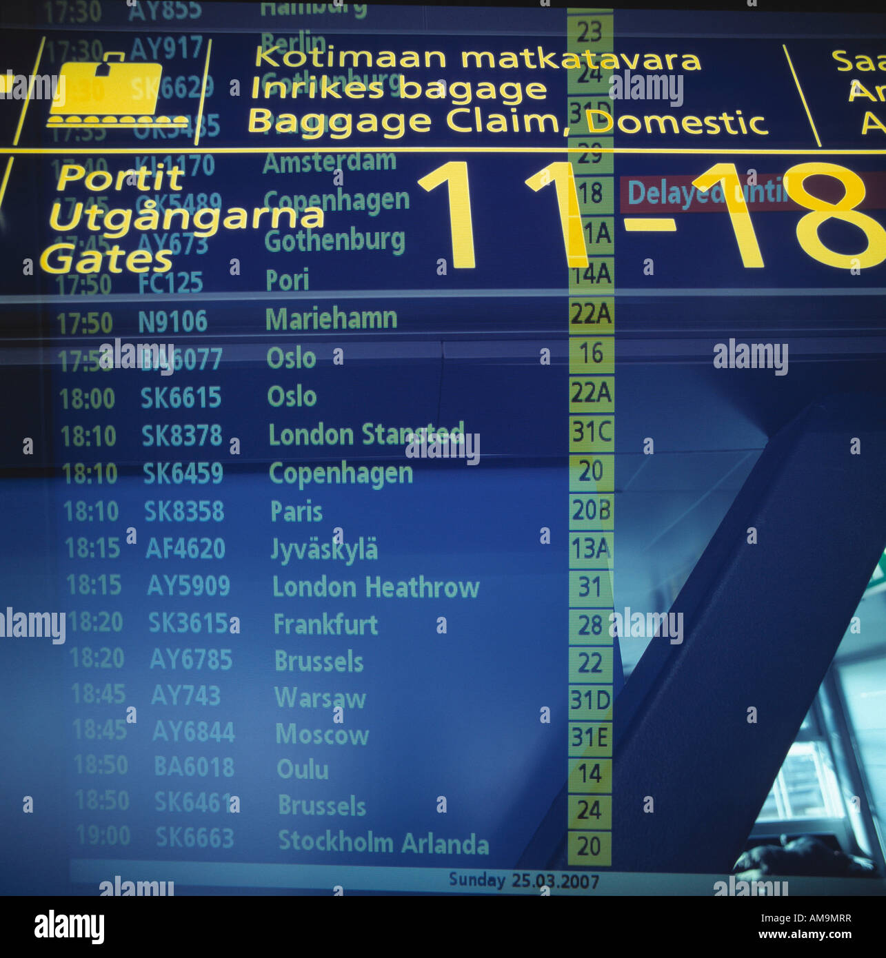 Overlapped signs in Helsinki Airport in Finland Stock Photo - Alamy