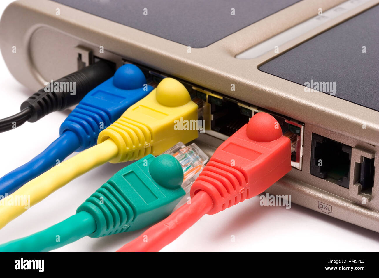 Ethernet cables plugged into router against white background Stock ...