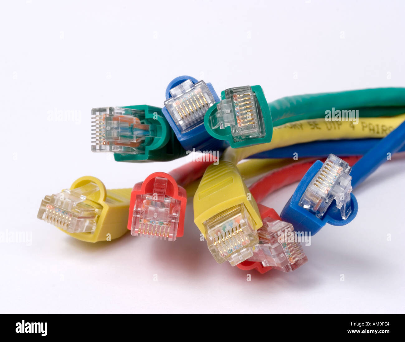 Ethernet cables against white background Stock Photo - Alamy