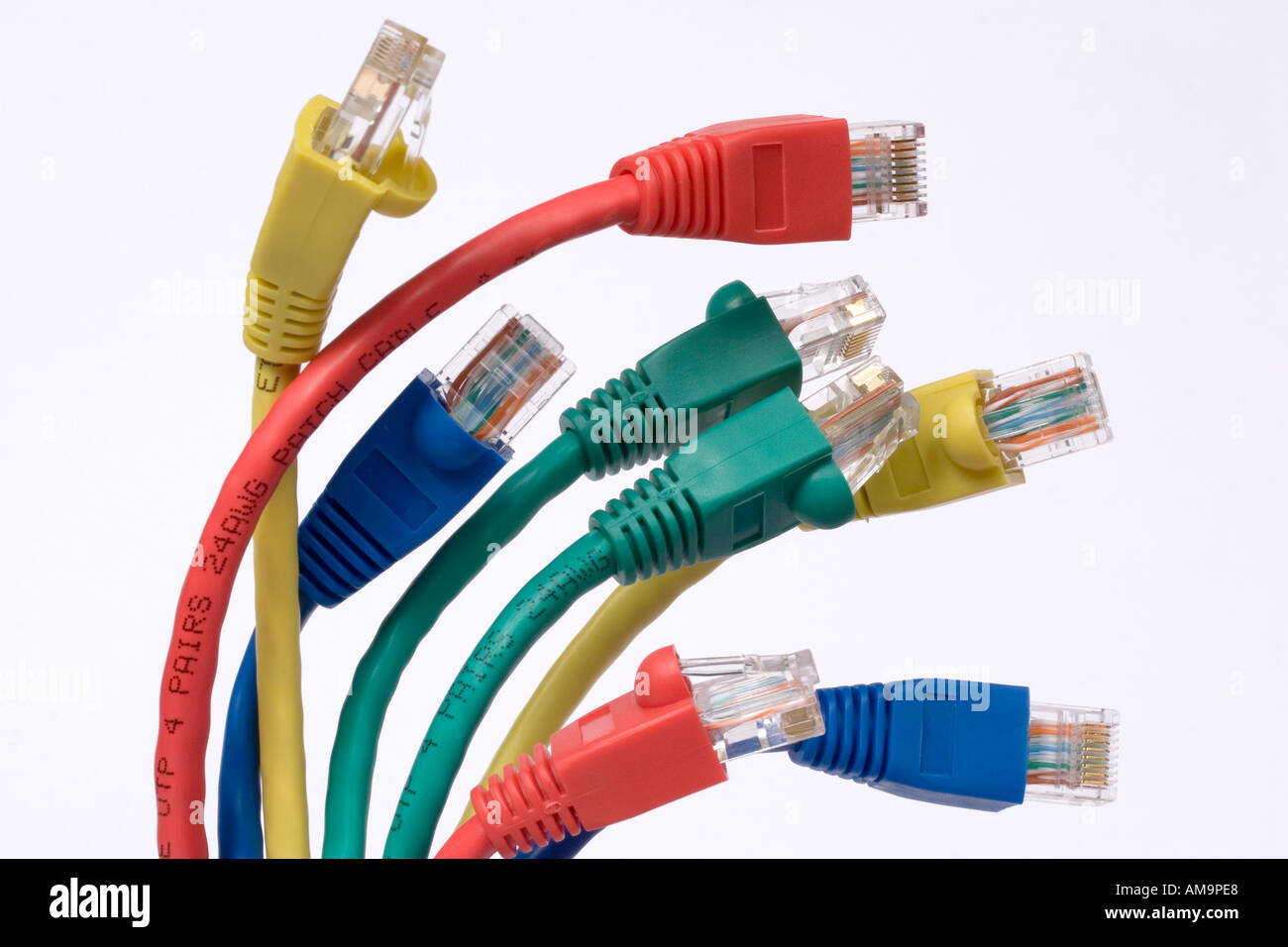 Ethernet cables against white background Stock Photo - Alamy