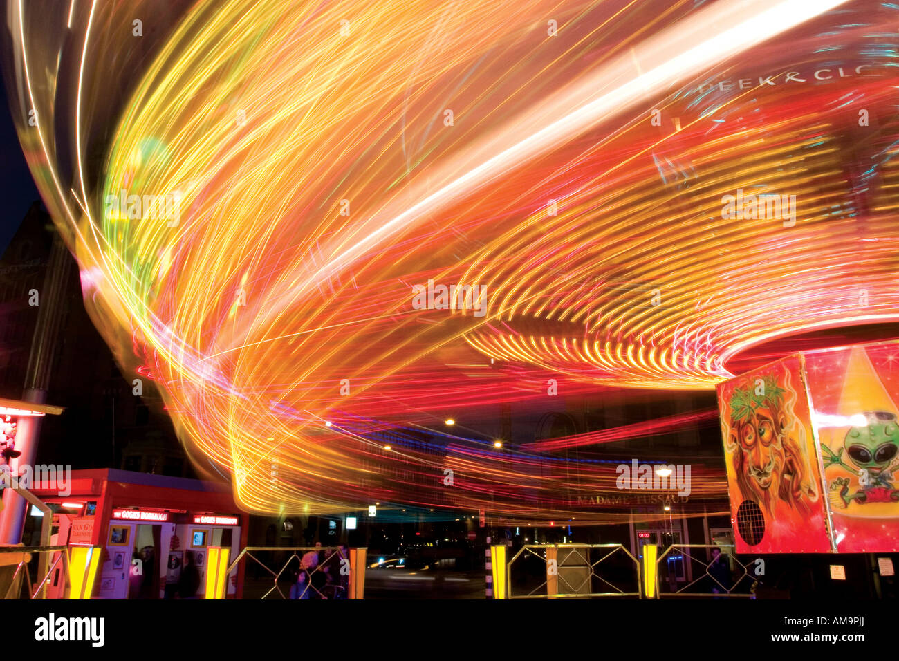 Carousel lights in motion shot at slow shutter speed Stock Photo - Alamy