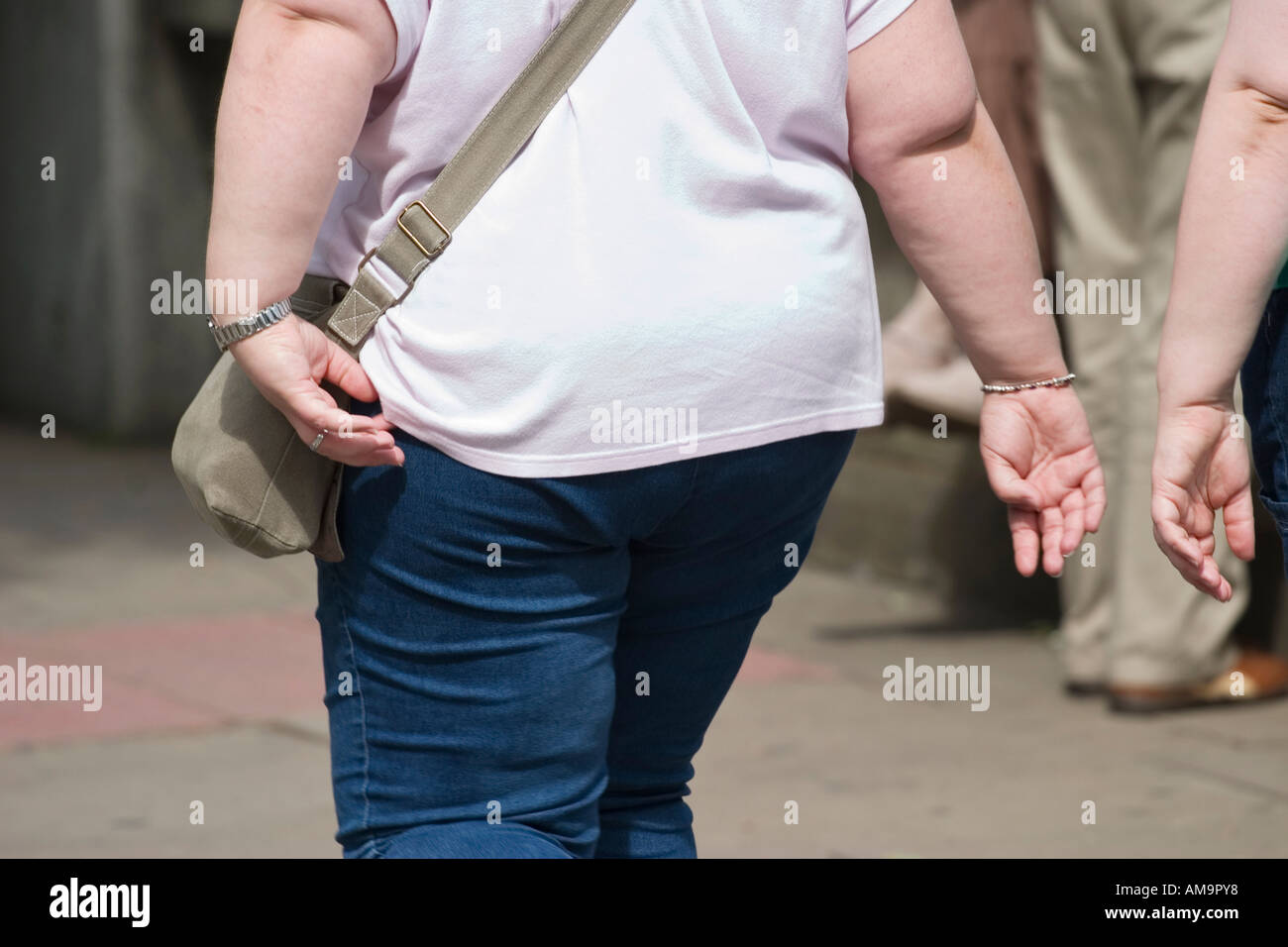 Obese woman walking Stock Photo - Alamy