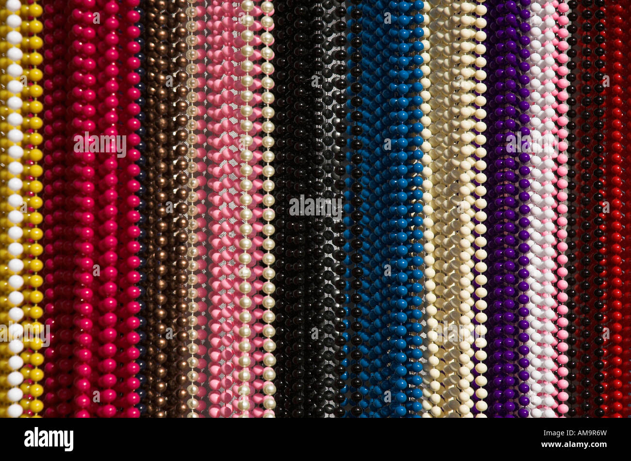 Rows of beads on a market stall Stock Photo - Alamy