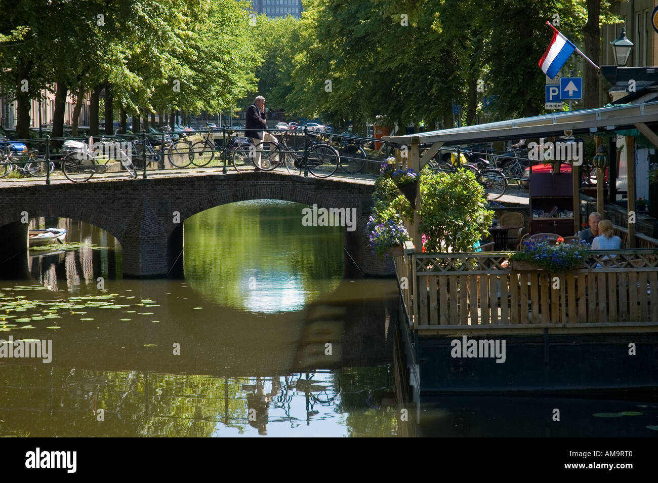 Canalside cafe in Den Haag city centre, Netherlands Stock Photo - Alamy