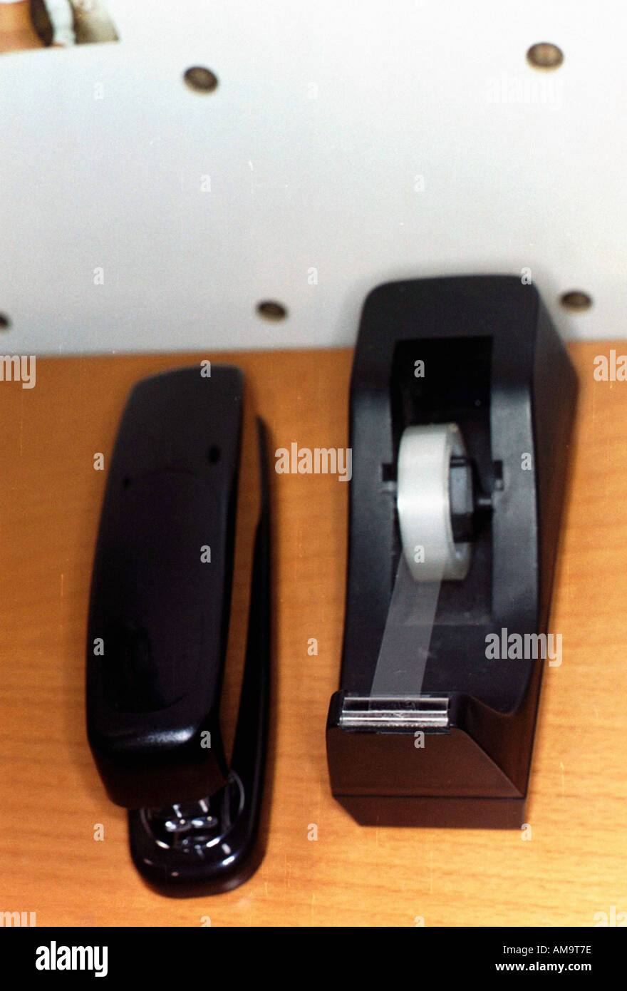 Still Life of a Stapler and Tape Dispenser Office Supplies Viewed From ...