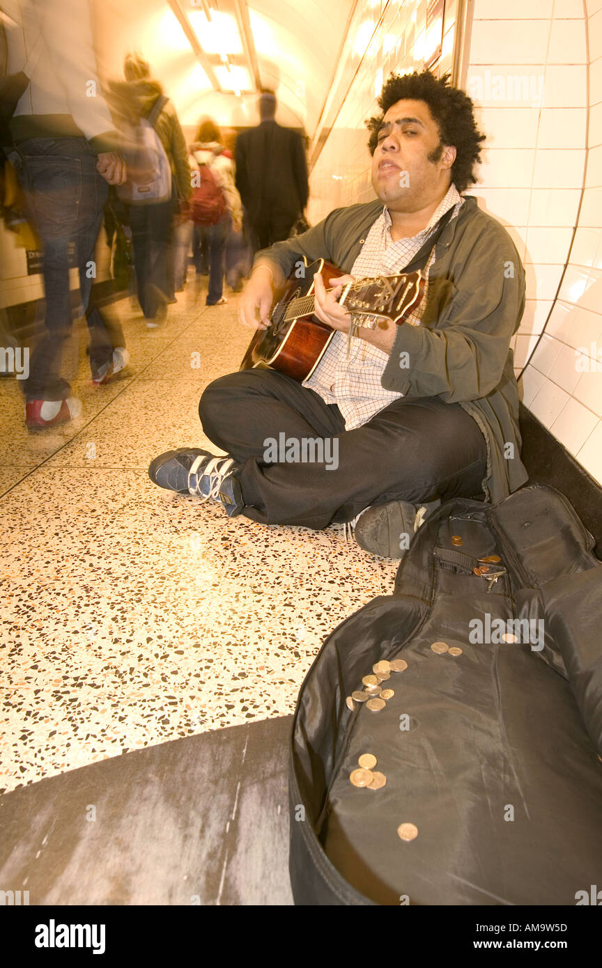 a busker on London underground Stock Photo - Alamy