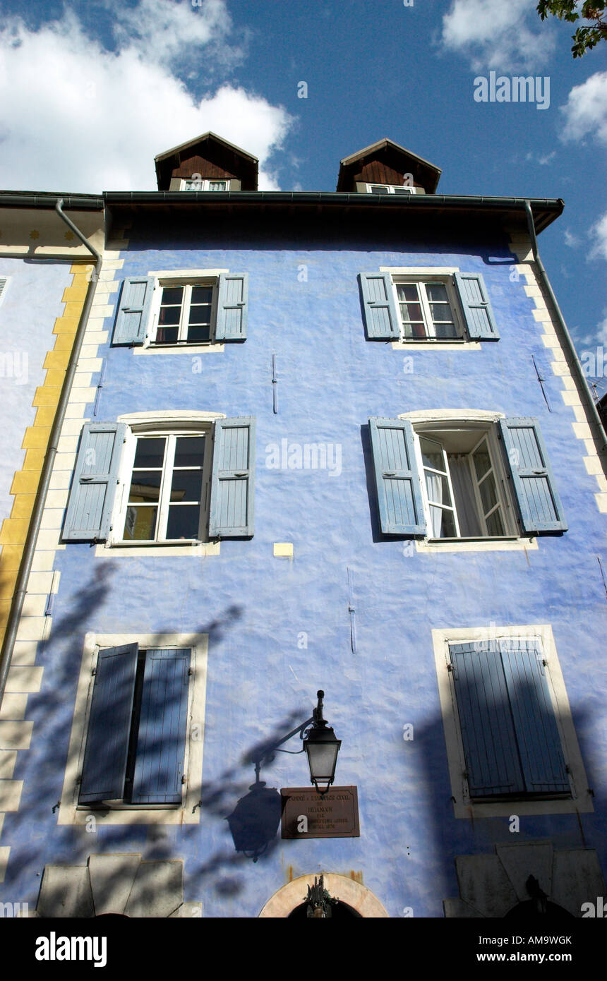 Looking up at a blue painted building in the lovely French town of ...