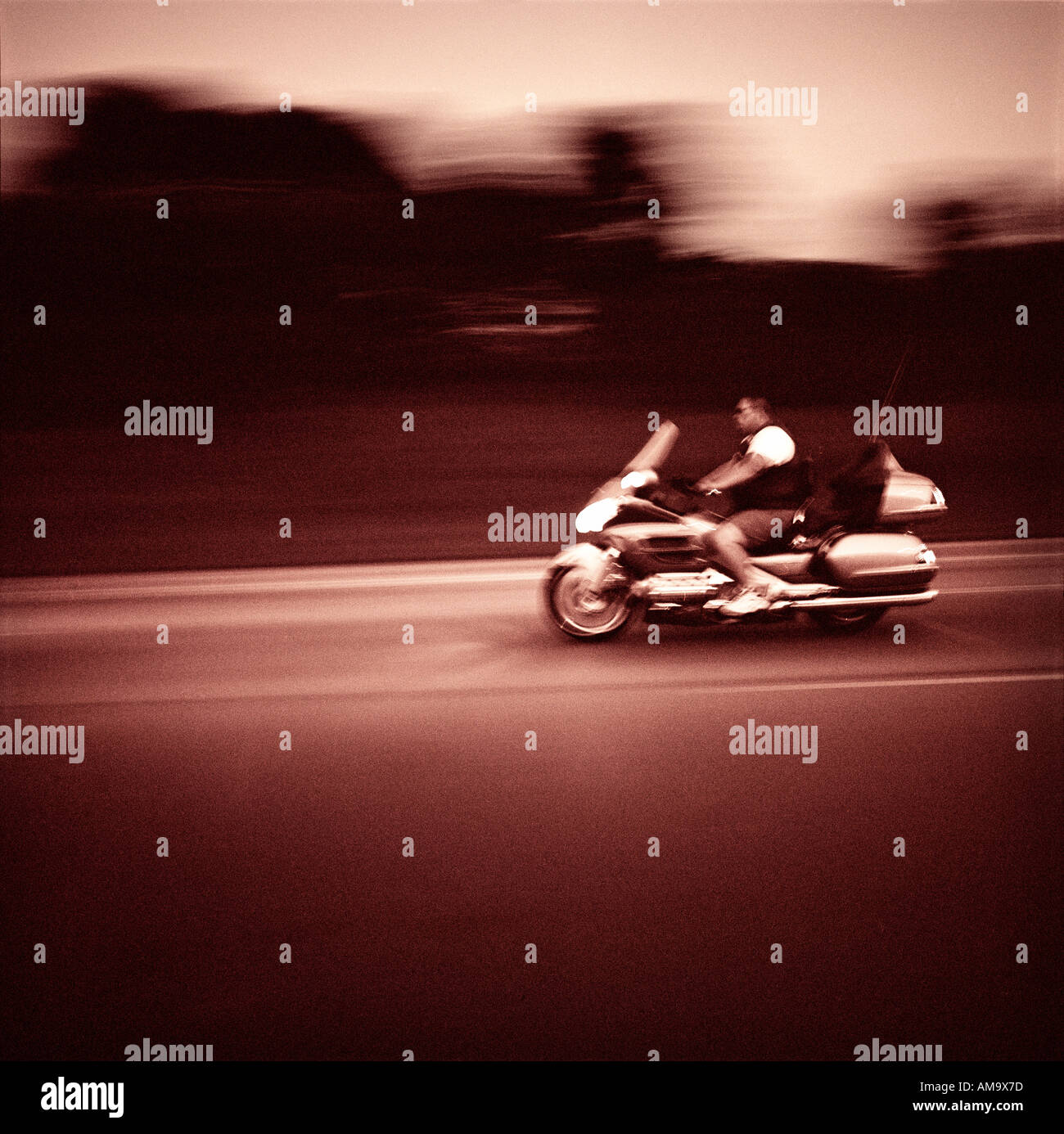 man riding a honda goldwing at night without a helmet on Stock Photo ...