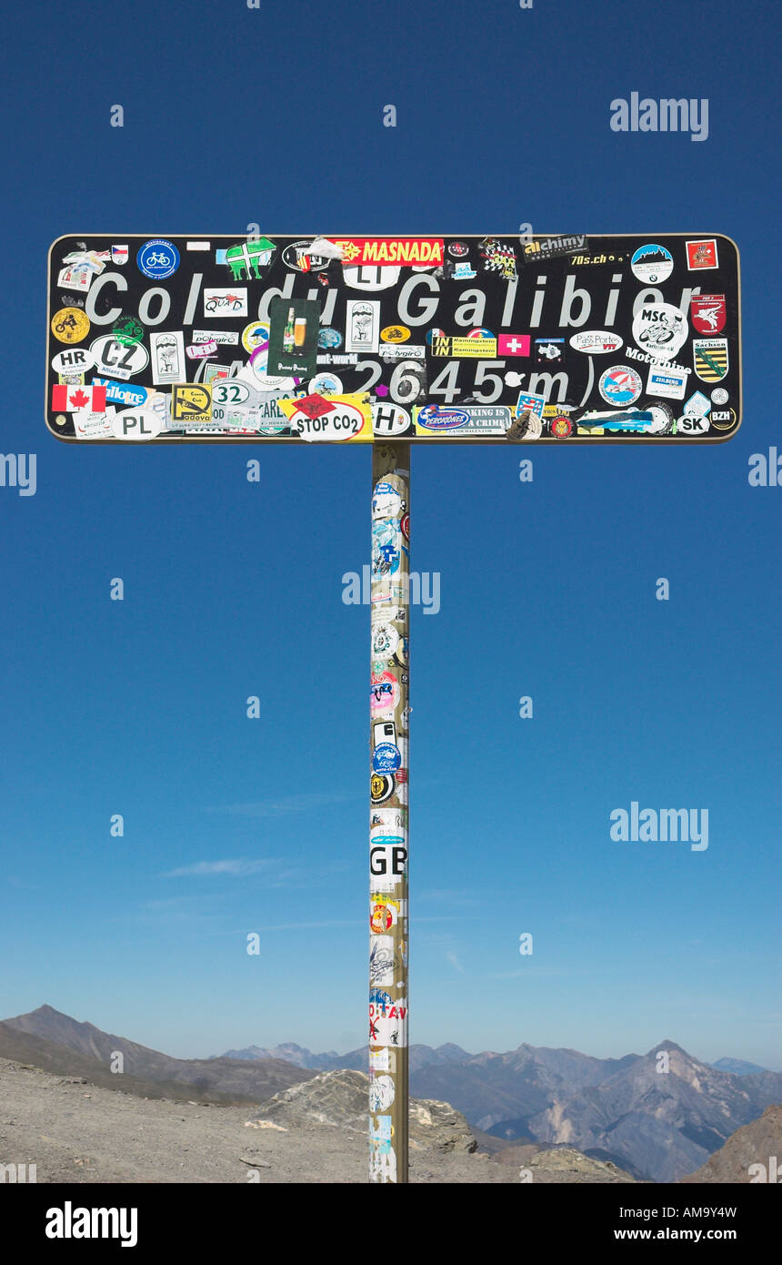 The sign for Col du Galibier covered in stickers Stock Photo - Alamy