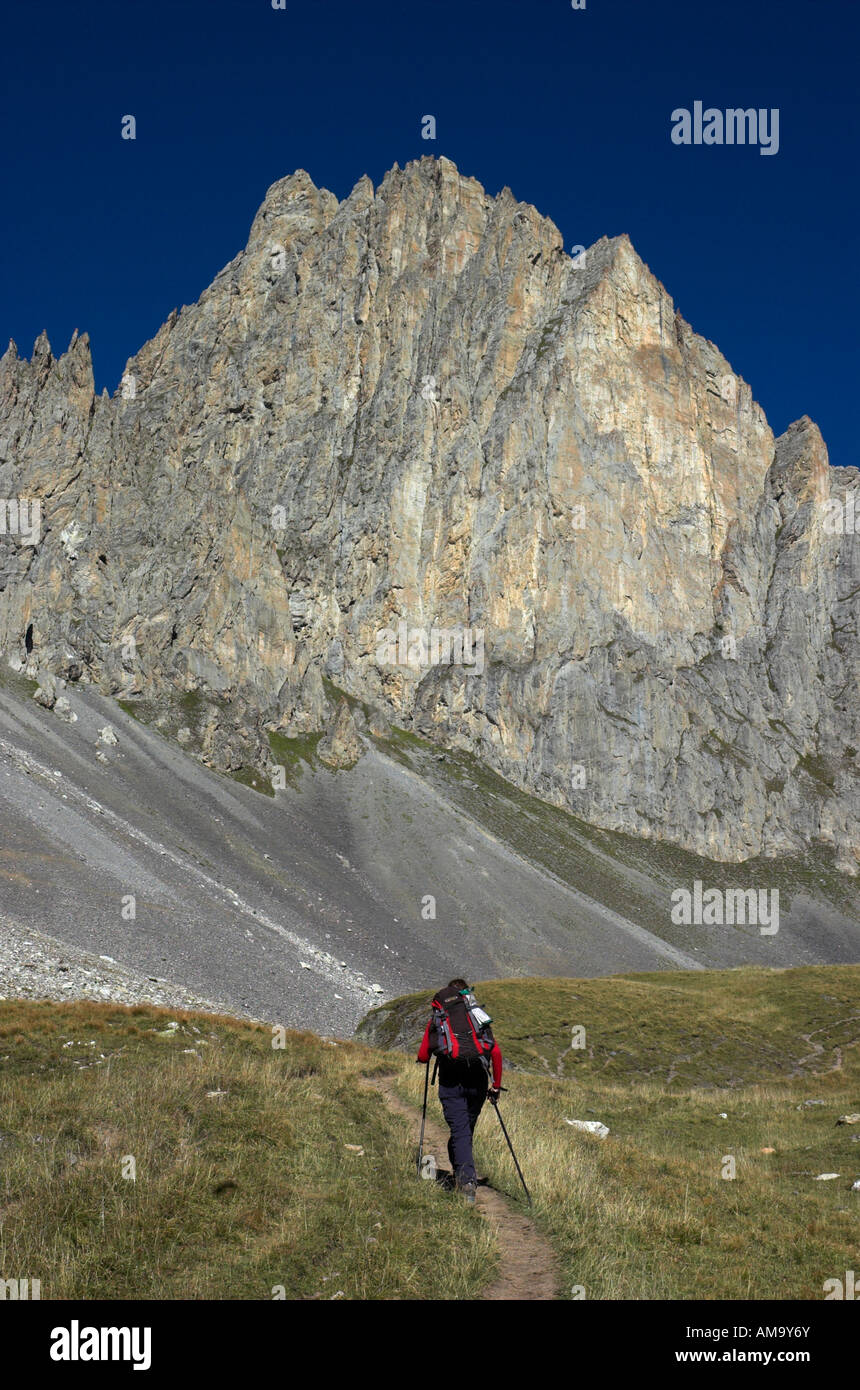 A mountain walker on a footpath in the French Alps Stock Photo - Alamy